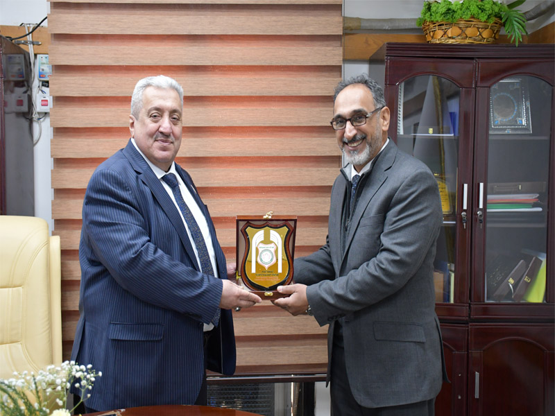 The Dean of the Institute honors Dr. Ali Abdul Hassan Qasim, Director ...